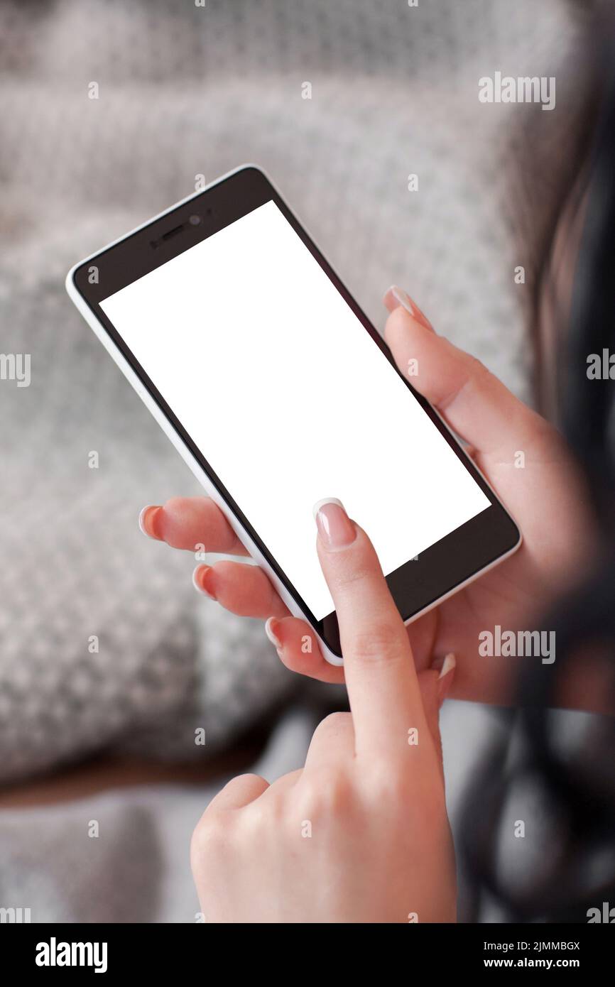 Empty screen of smartphone in womans hands Stock Photo - Alamy