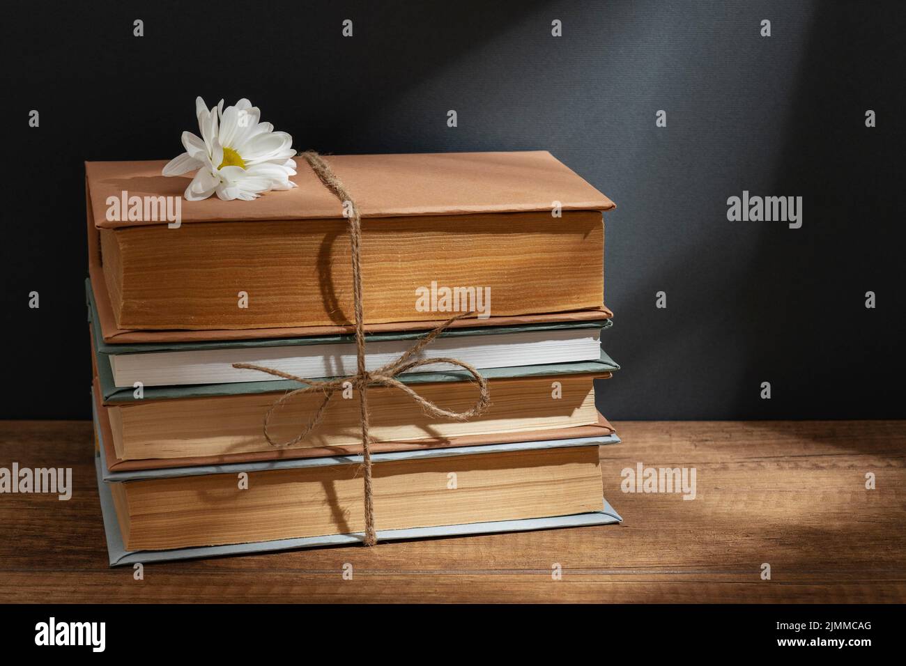 Creative composition with books flower Stock Photo - Alamy