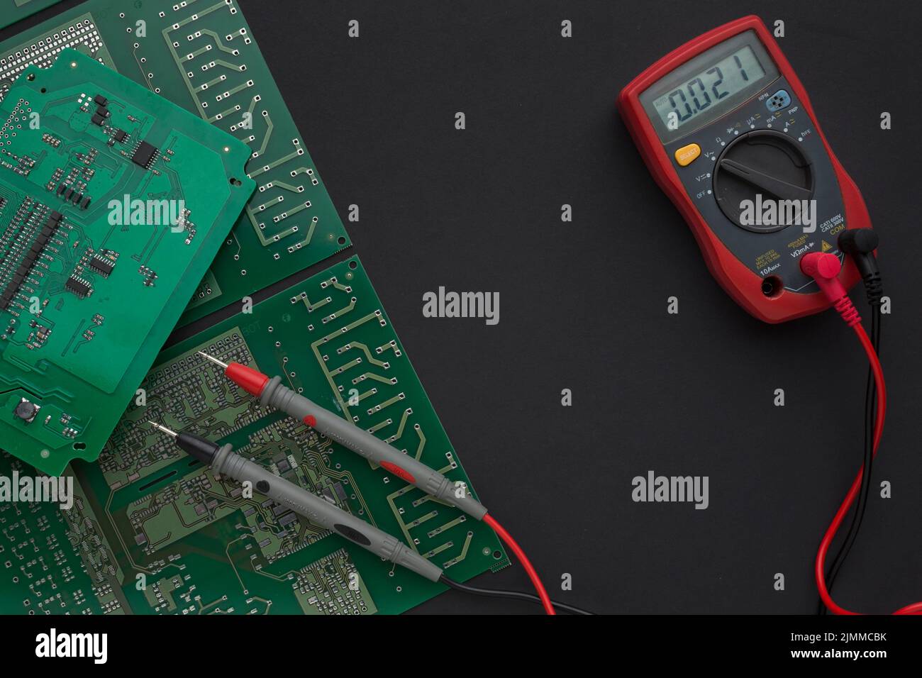 Close up circuit board with multimeter Stock Photo - Alamy