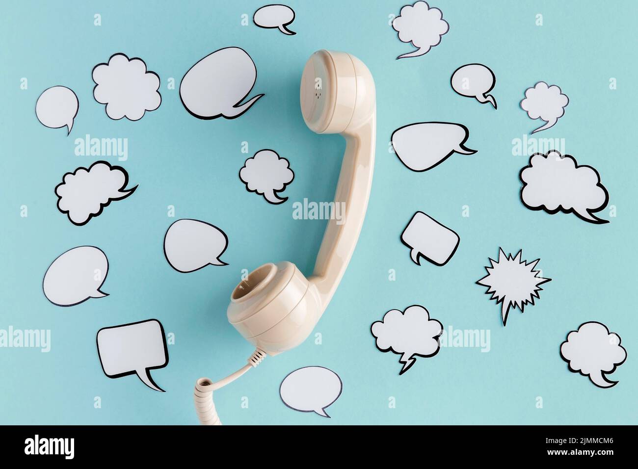 Top view chat bubbles with telephone receiver Stock Photo - Alamy