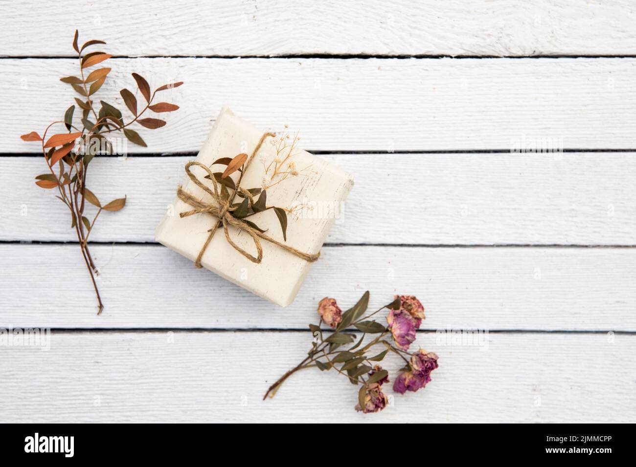 Small cute gift with dried plants Stock Photo - Alamy