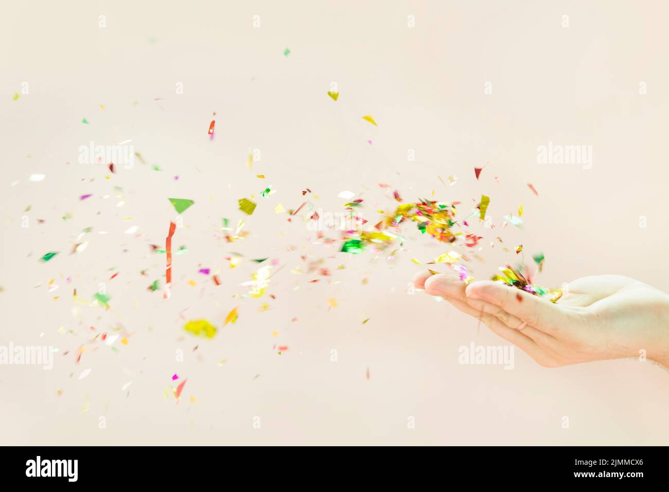 Hands and confetti hi-res stock photography and images - Alamy