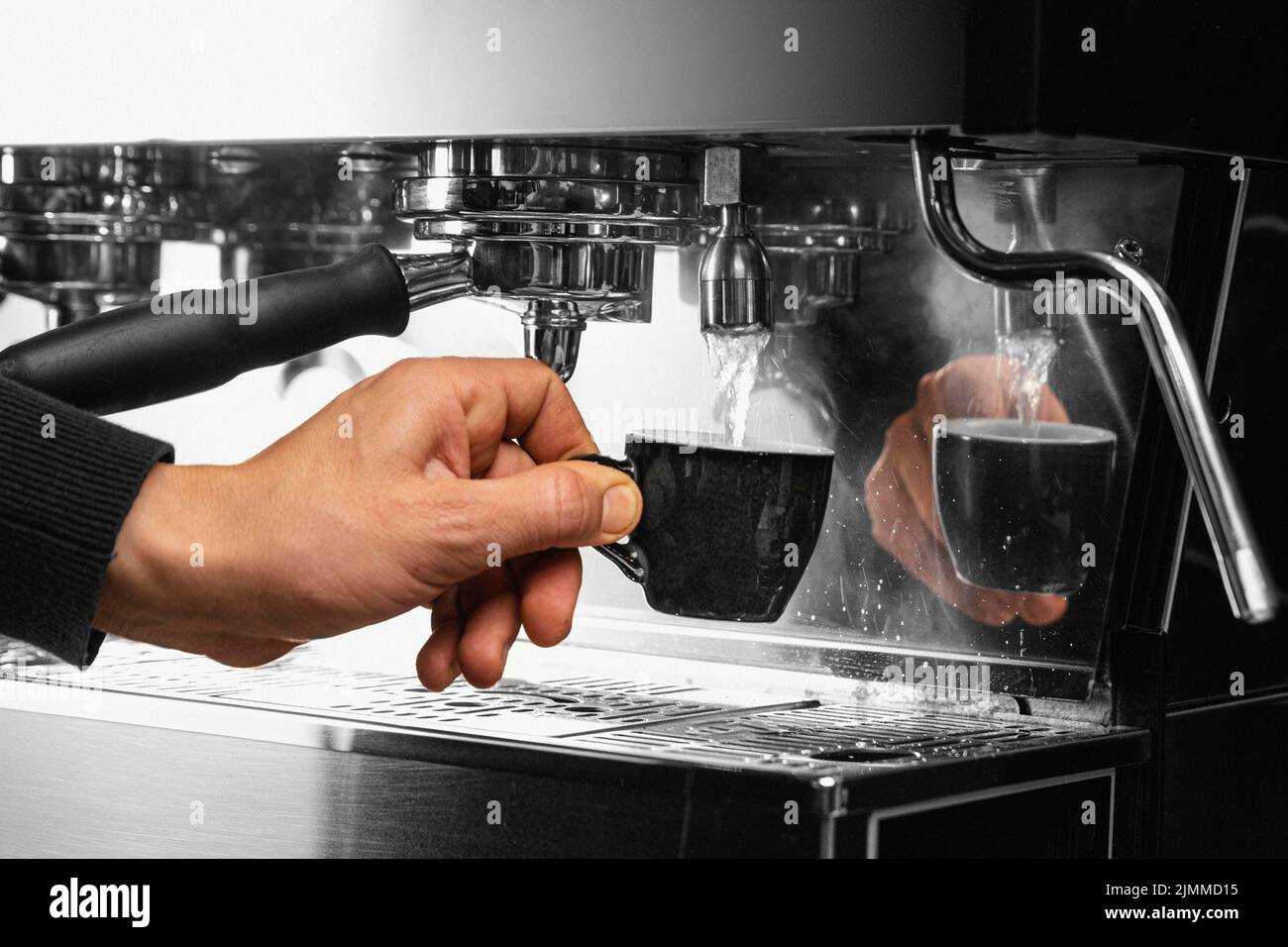 Close up hand holding coffee cup Stock Photo - Alamy