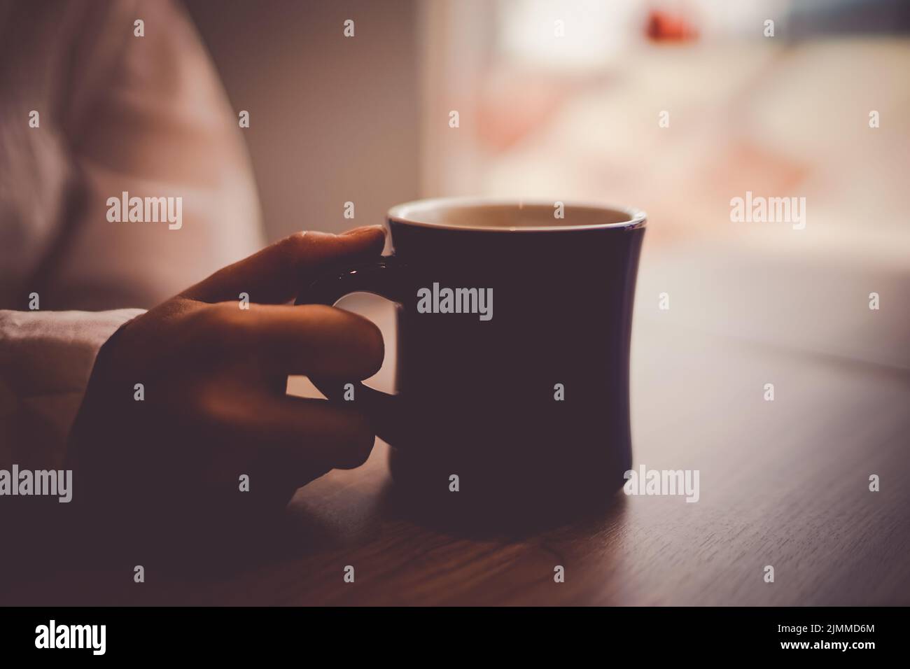 Women and hand drinking hot coffee Stock Photo - Alamy