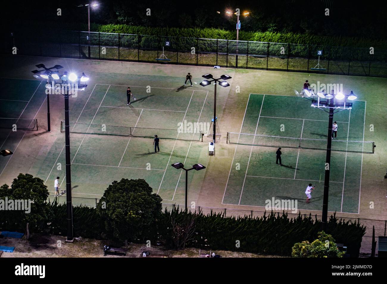Night tennis courts Stock Photo - Alamy