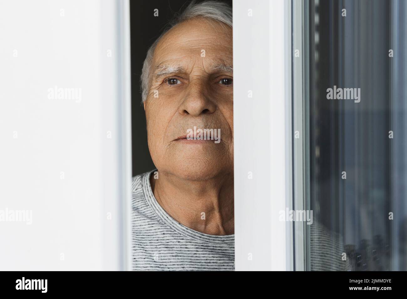 Elderly looking window hi-res stock photography and images - Alamy