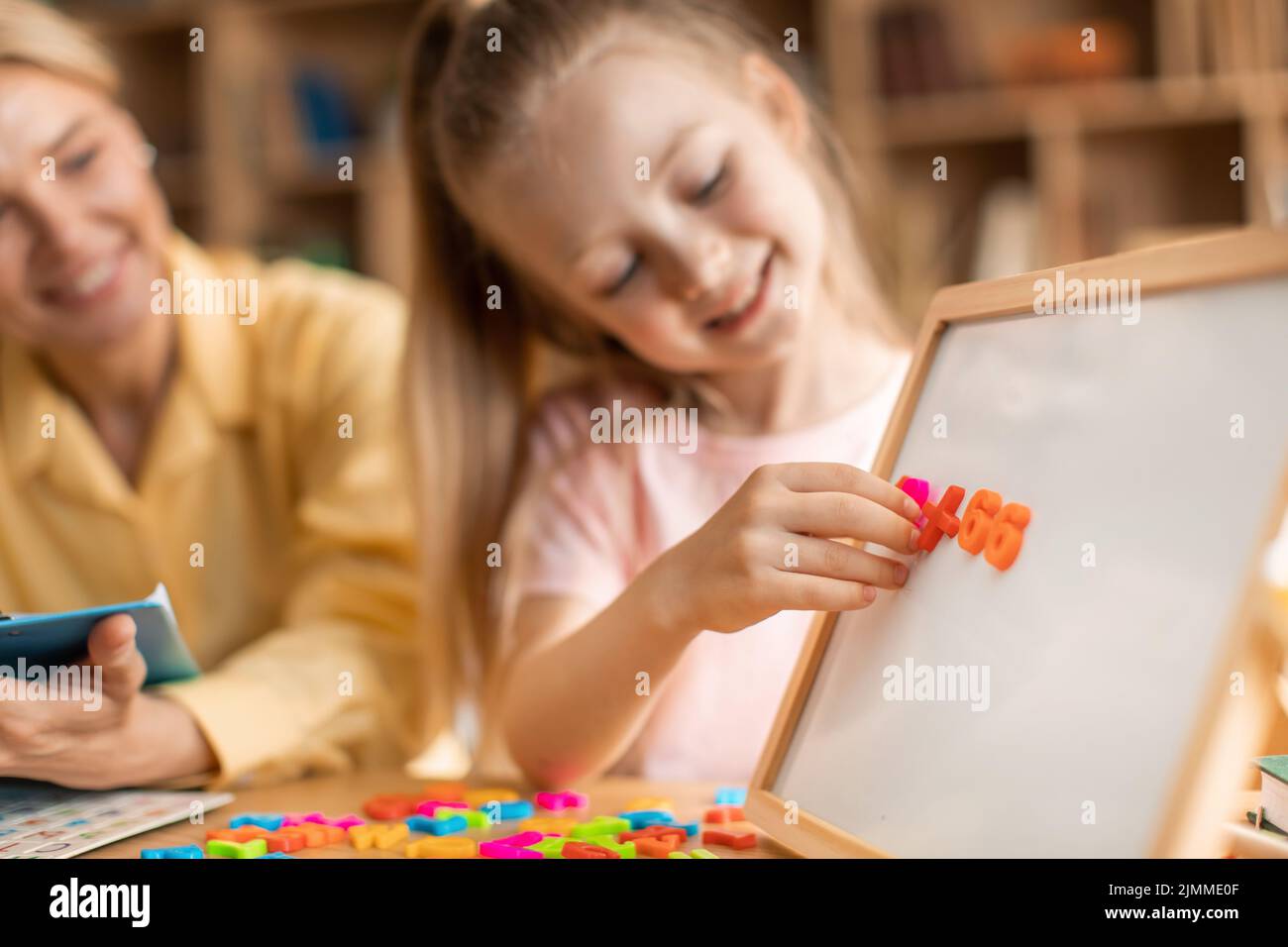 Happy cute girl learning alphabet, cheerful female child development ...