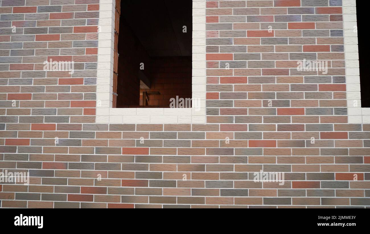 windowless brick building. Facade of a brick house Stock Photo - Alamy