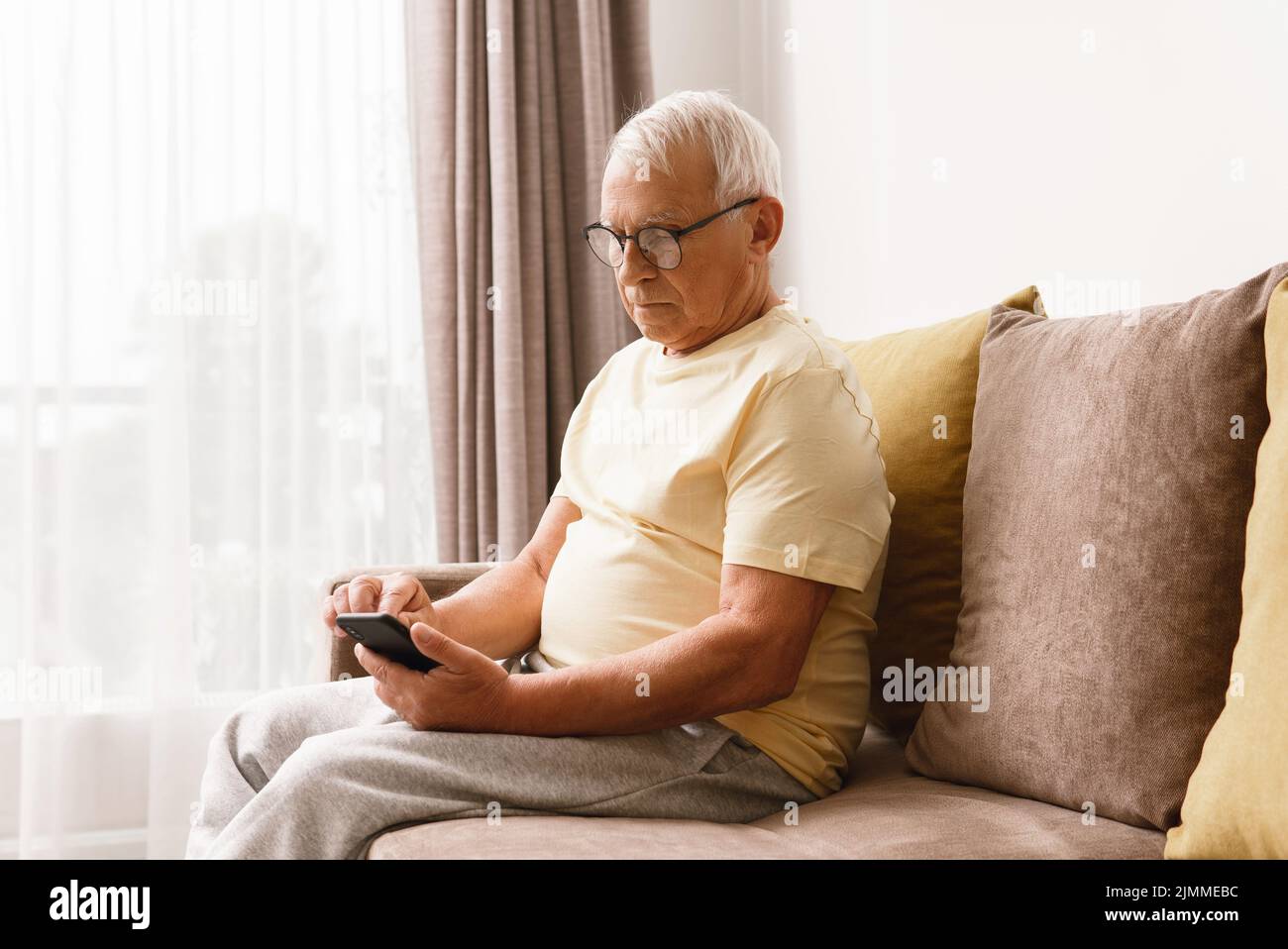 Progressive senior man sitting hi-res stock photography and images - Alamy