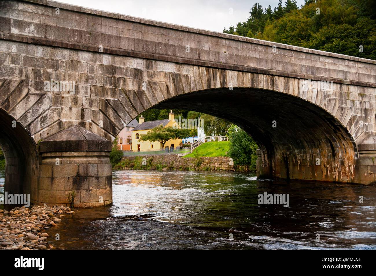 Stone arched Avoca Bridge over the River Avoca in Avoca, Ireland Stock ...