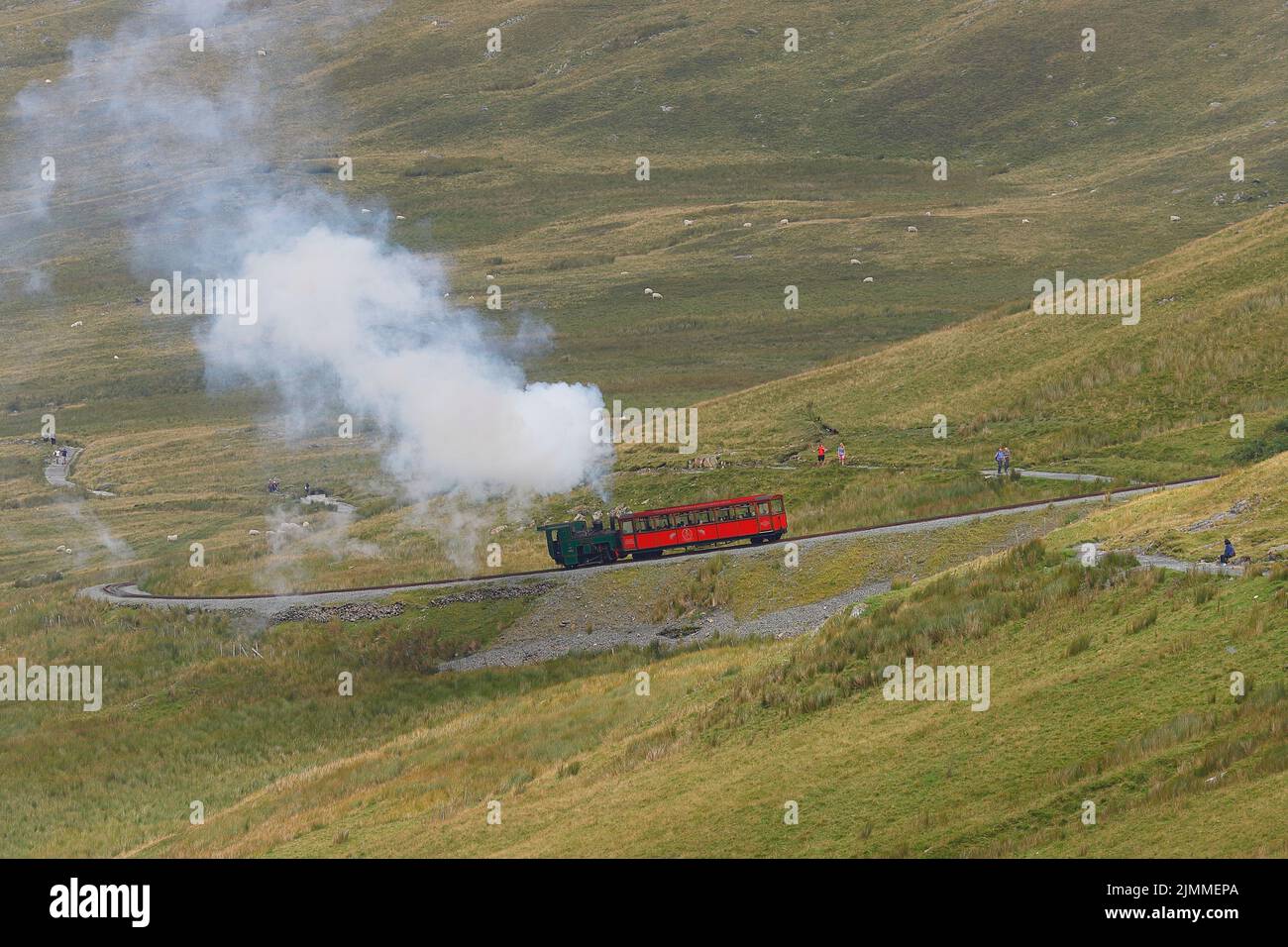 A steam train hauling passengers up to Snowdon Summit on the Snowdon ...