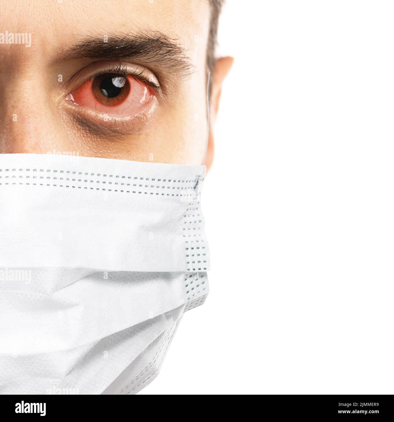 Caucasian man with virus symptoms wearing prevention mask Stock Photo ...
