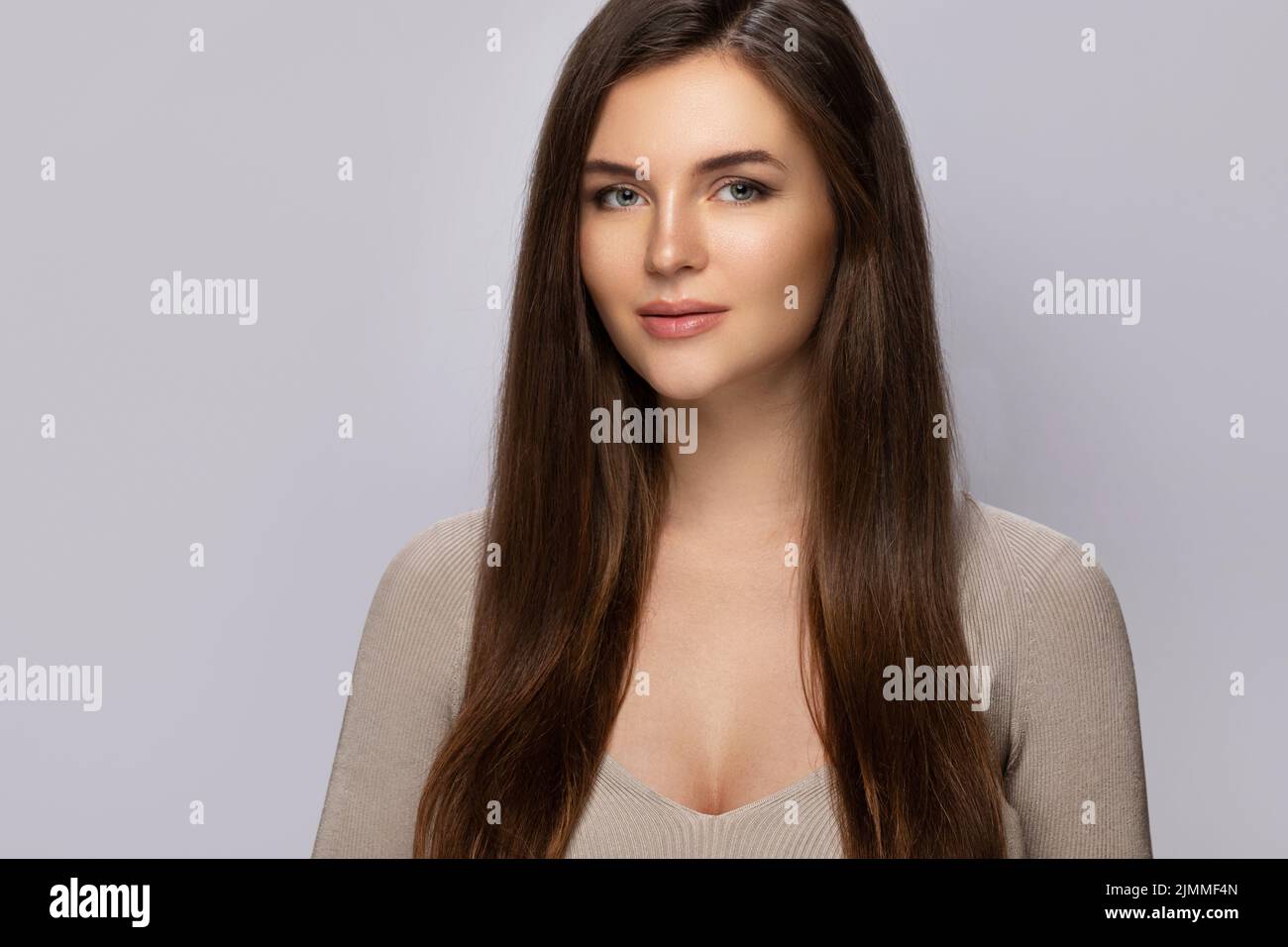 Young pretty woman with a beautiful long hair Stock Photo - Alamy