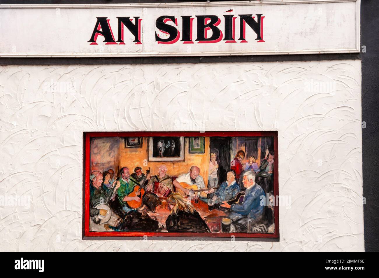 Outdoor public art of traditional Irish music session in Carrick-on ...