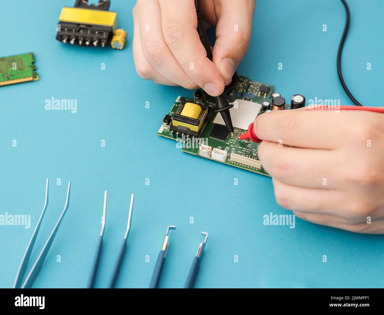 Diagnosing circuit using multimeter Stock Photo - Alamy