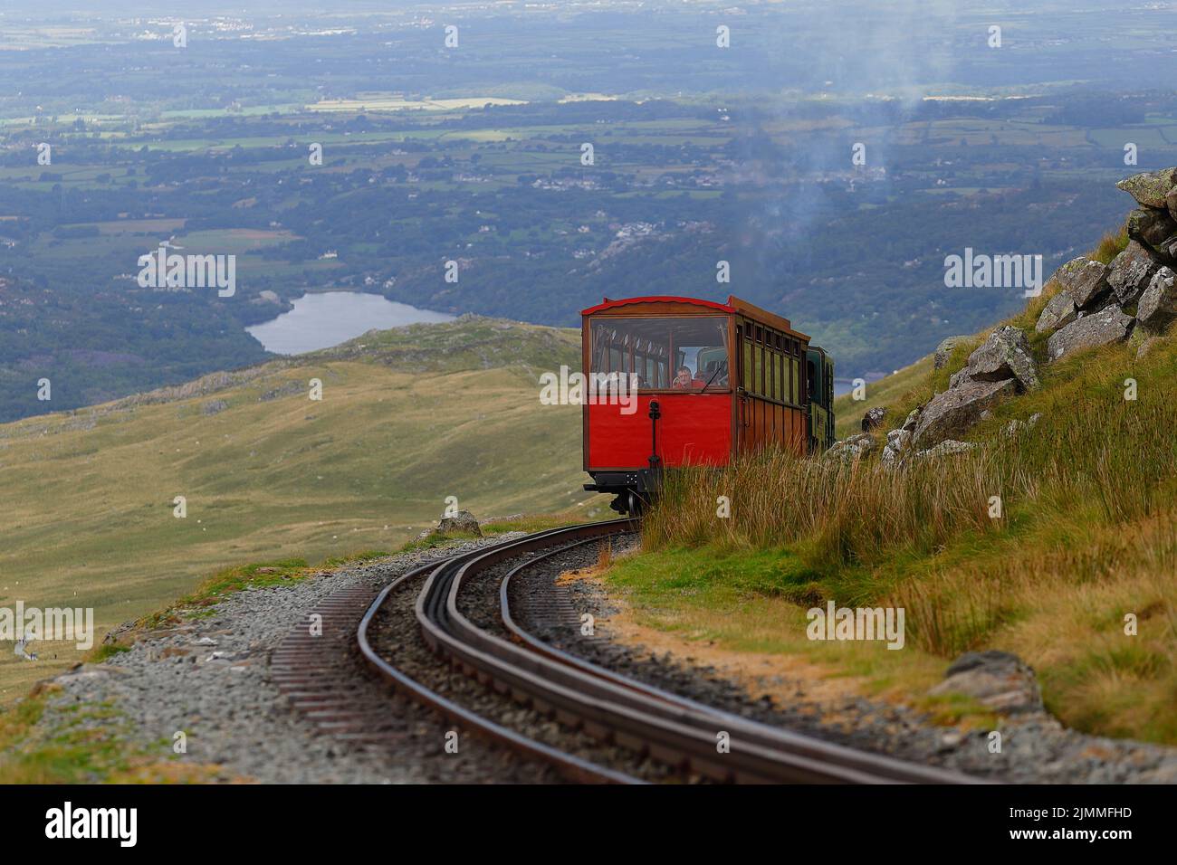 A steam train hauling passengers up to Snowdon Summit on the Snowdon ...