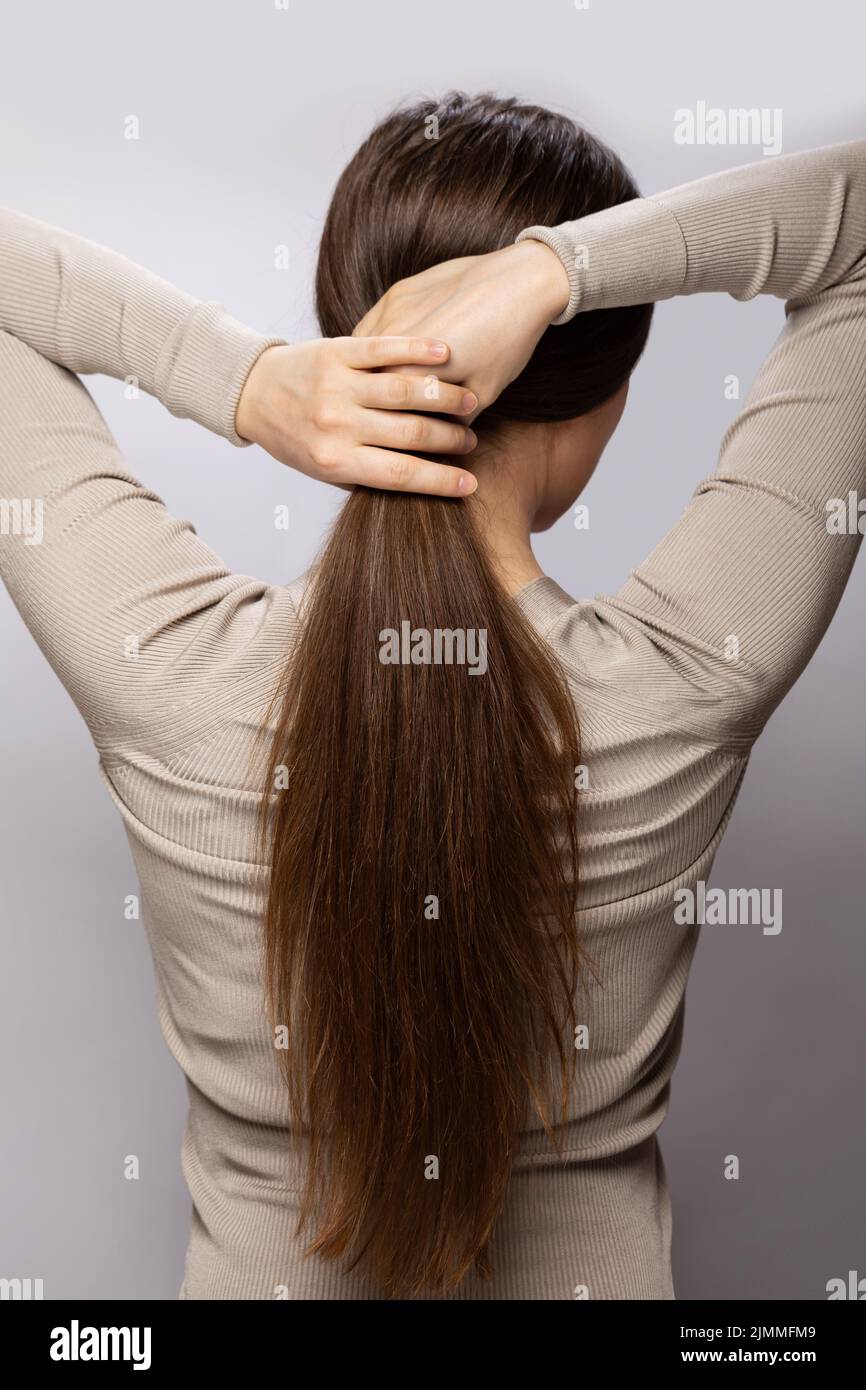 Young woman showing her healthy natural hair Stock Photo - Alamy