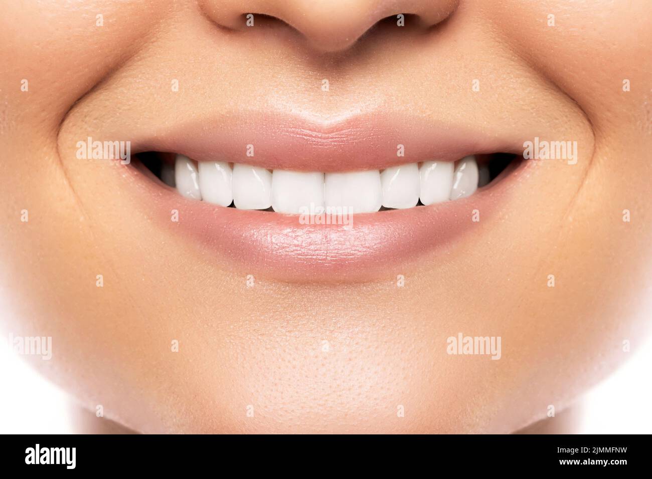 Beautiful female smile with a white teeth Stock Photo - Alamy