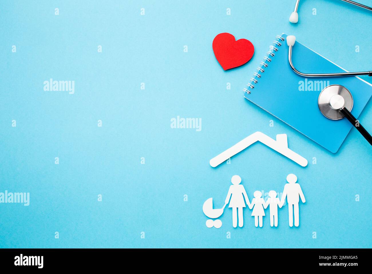 Family figure shape stethoscope with copy space Stock Photo - Alamy