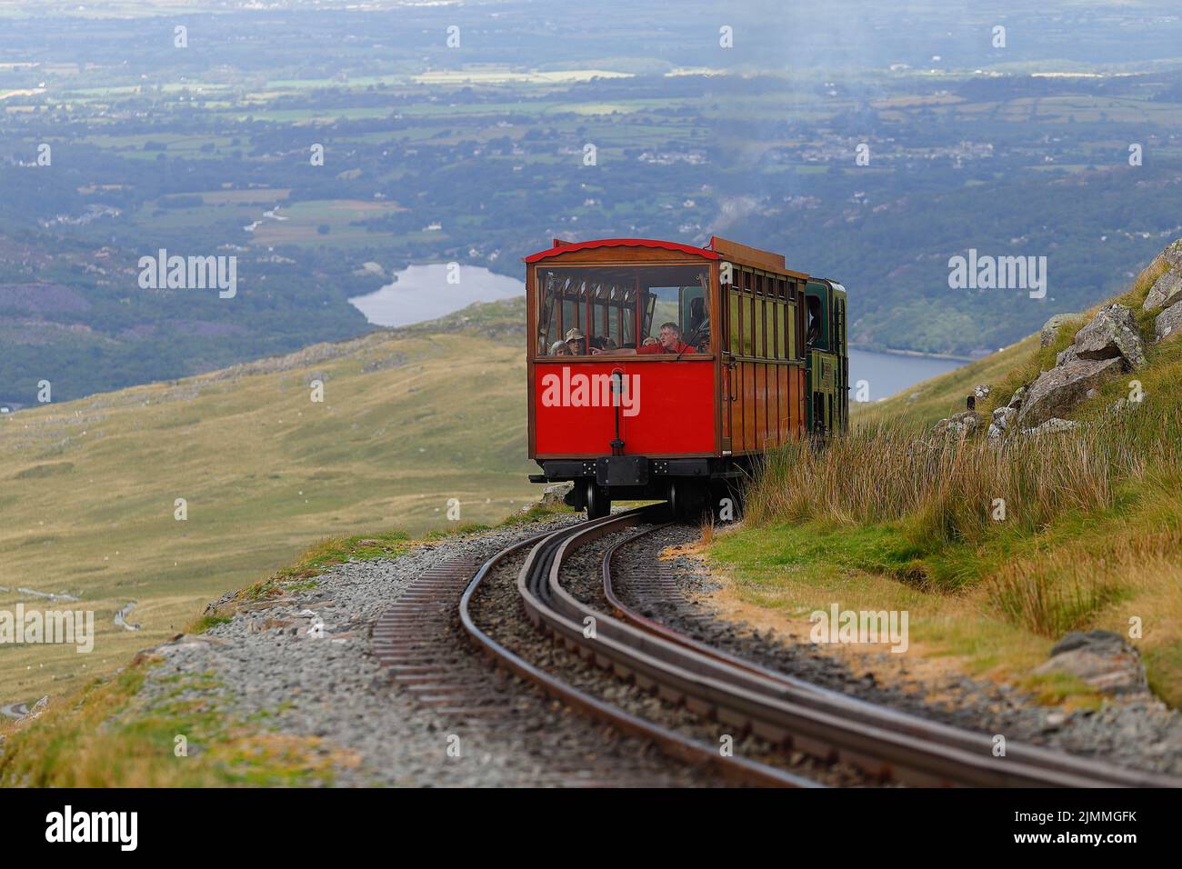 A steam train hauling passengers up to Snowdon Summit on the Snowdon ...