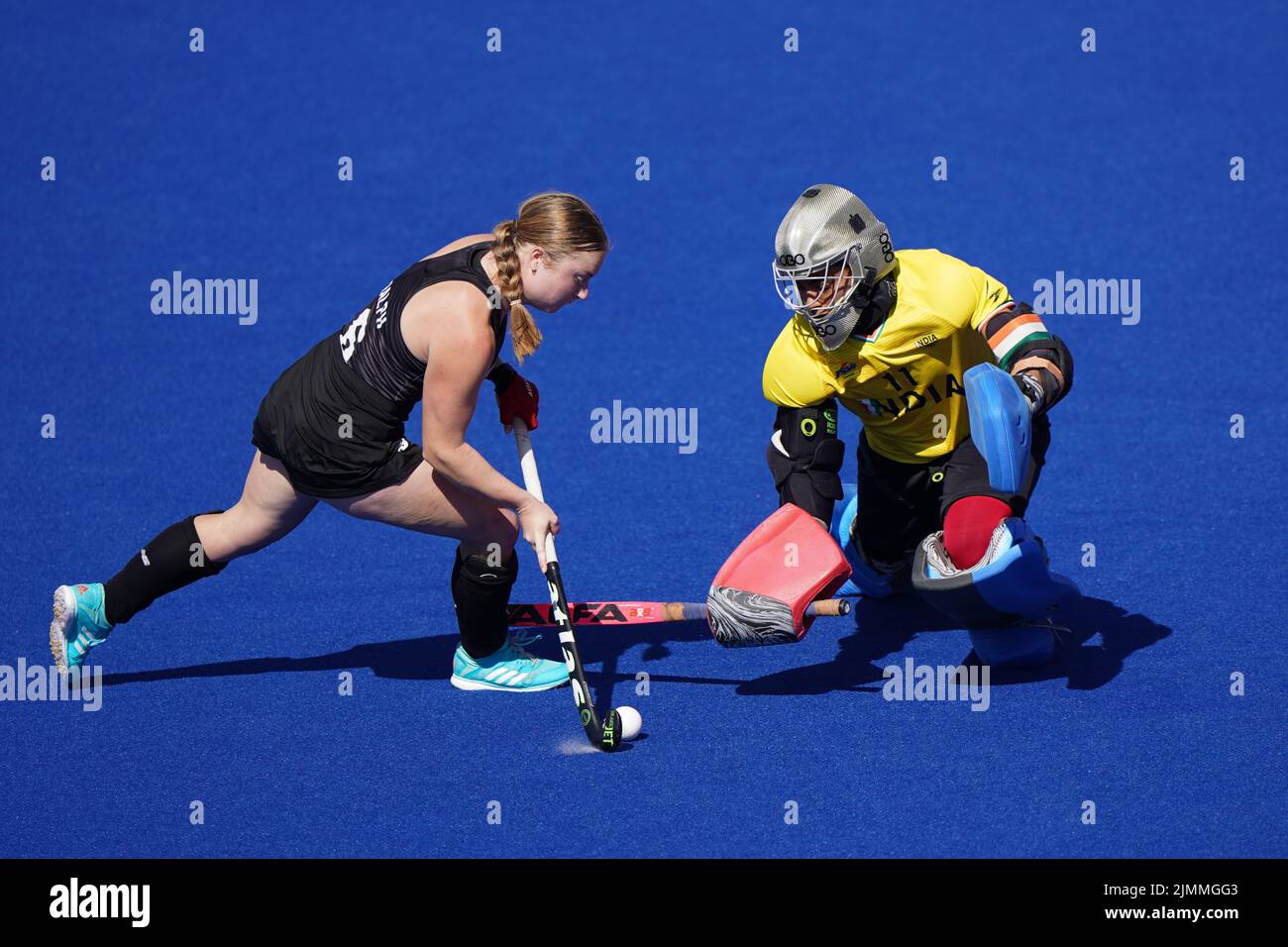 India goalkeeper Savita saves at the feet of New Zealand's Hope Ralph ...