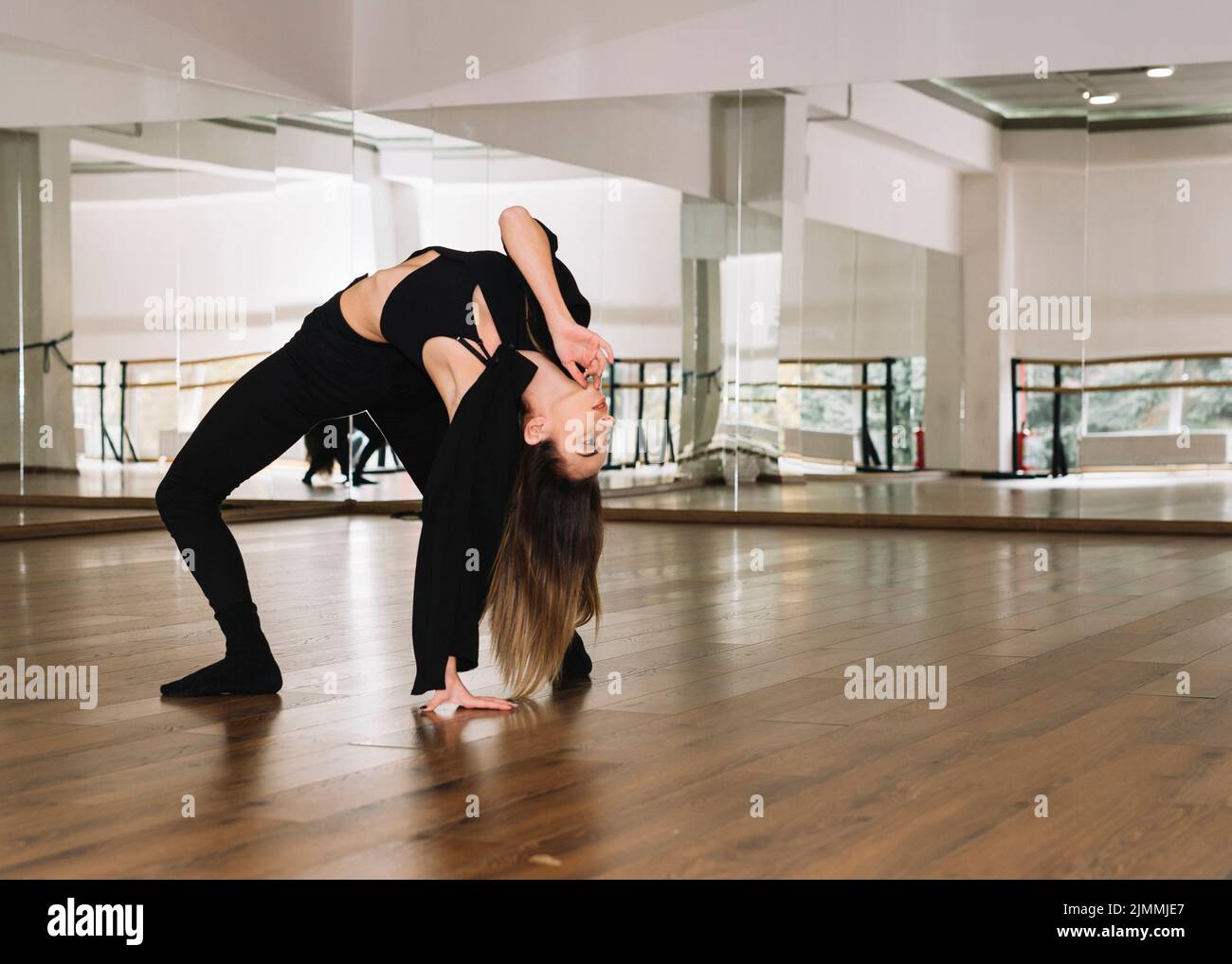 Young female dancer practising dance studio Stock Photo - Alamy