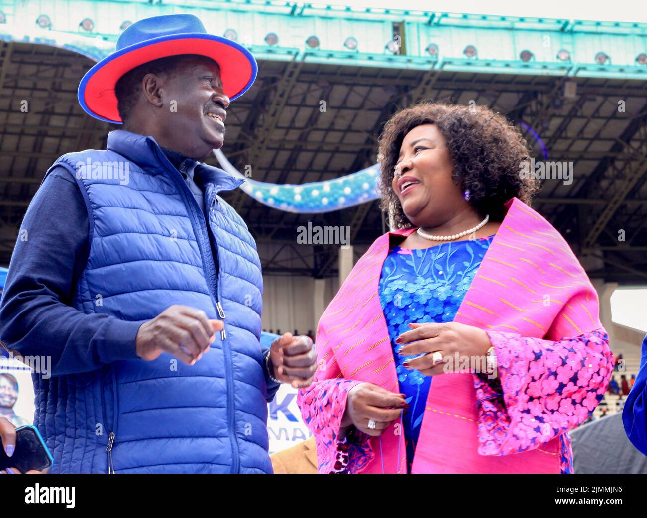 The Azimio la Umoja One Kenya flag bearer Raila Odinga (L) and his wife ...