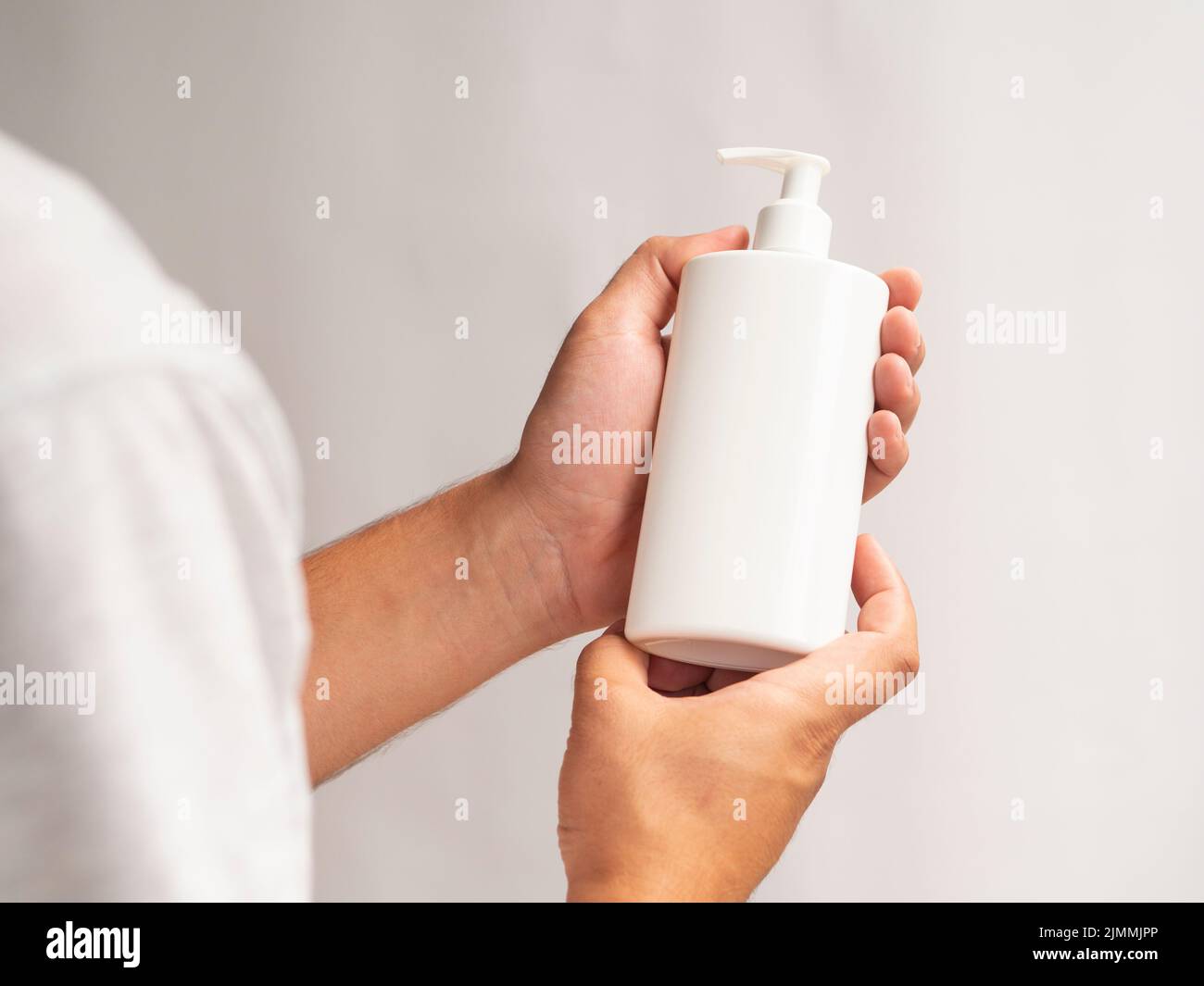 Female pharmacist holding bottle hi-res stock photography and images ...