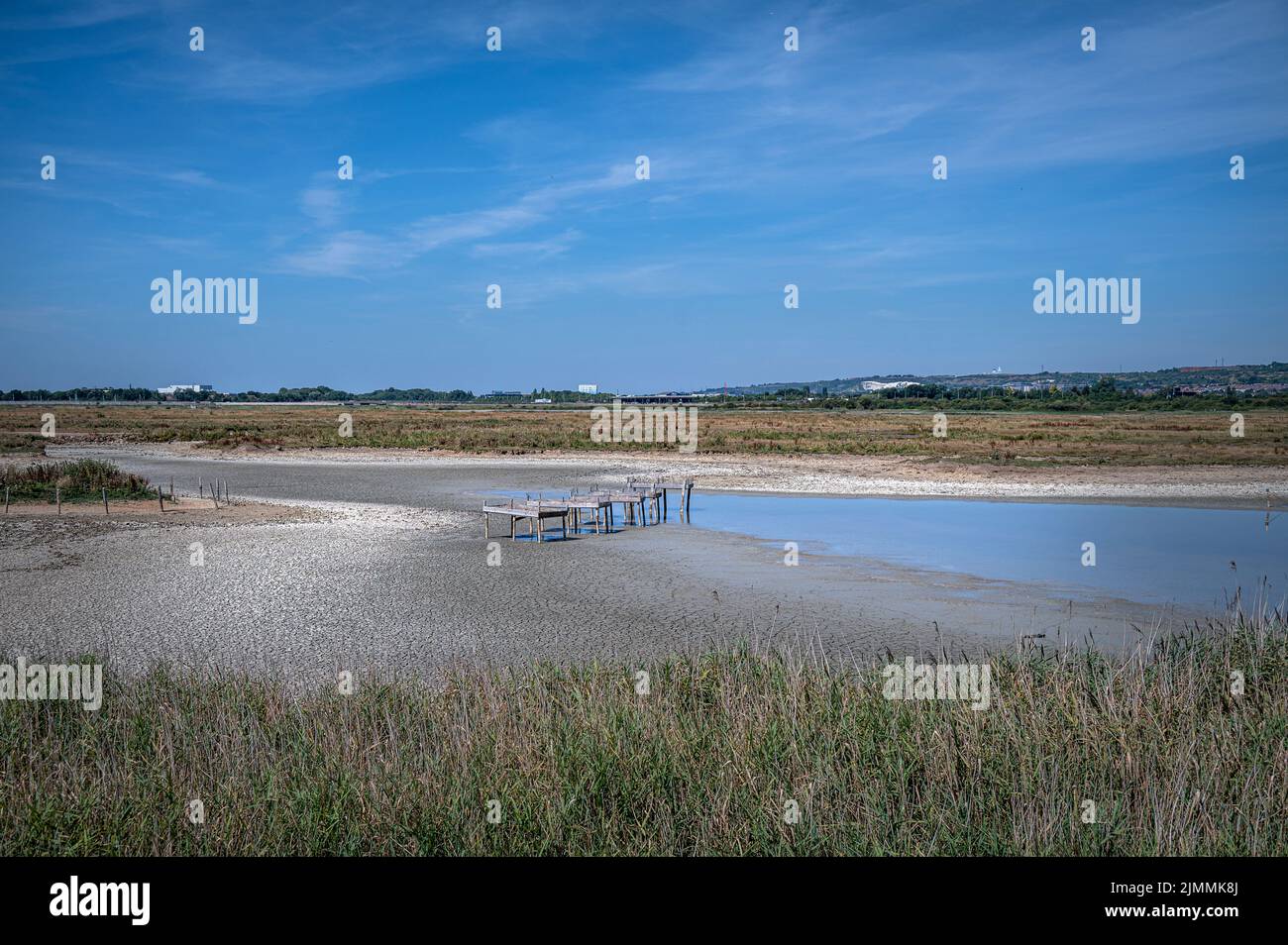 Dried up marsh land and nature reserve following a very dry summer in ...