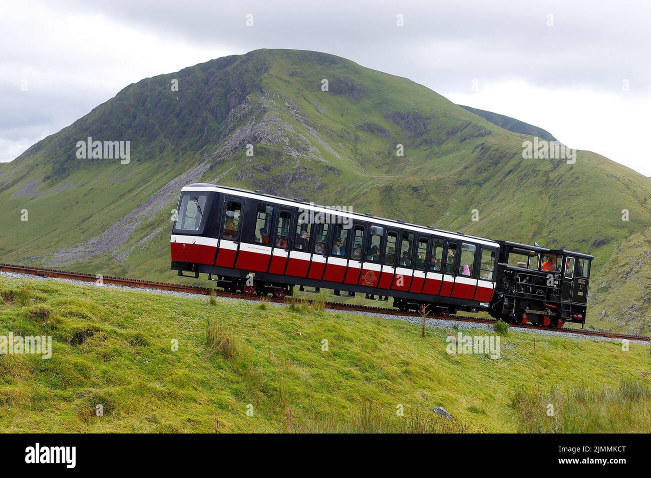 A diesel train hauling passengers up to Snowdon Summit from Llanberis ...