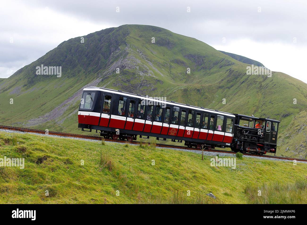 A diesel train hauling passengers up to Snowdon Summit from Llanberis ...