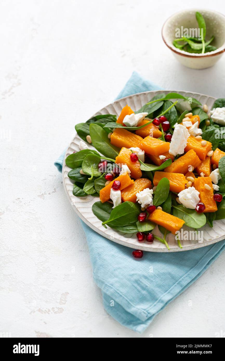 Roasted pumpkin salad with fruits and greens healthy eating Stock Photo ...