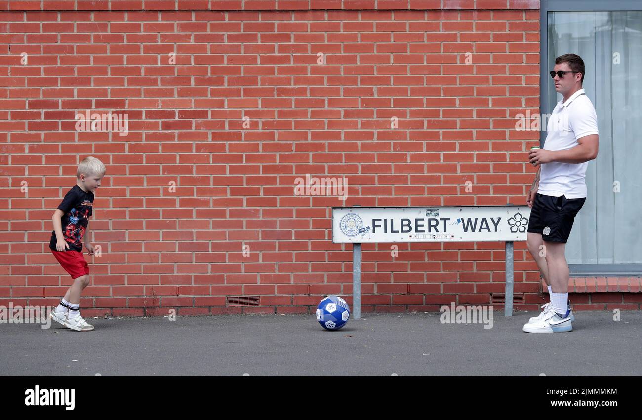 Fans playing football outside the ground ahead of the Premier League ...
