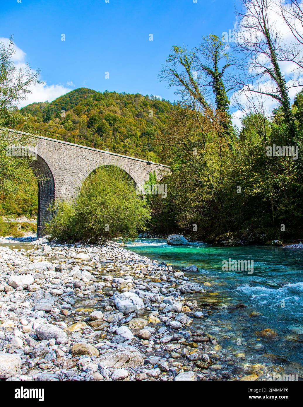 The viaduct over the shallow river Stock Photo - Alamy