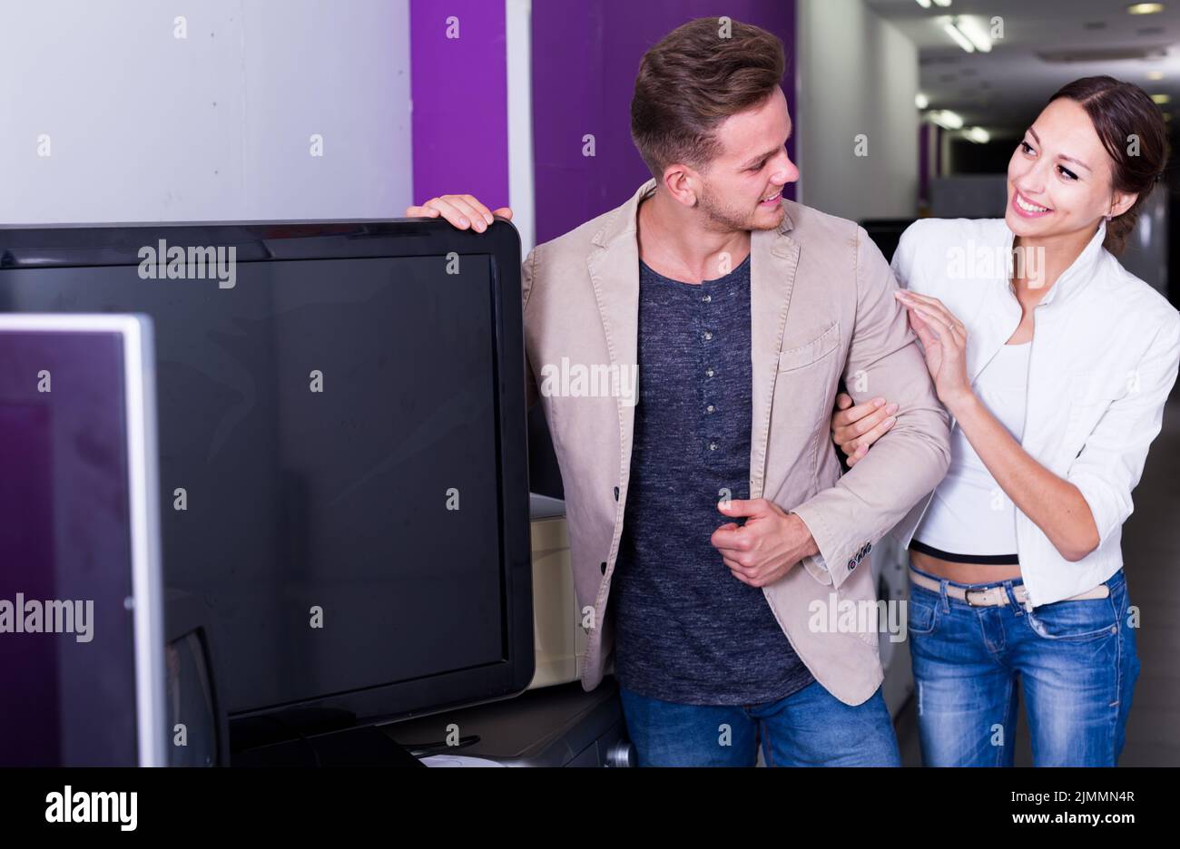 Ordinary smiling family purchasing hi-res stock photography and images - Alamy