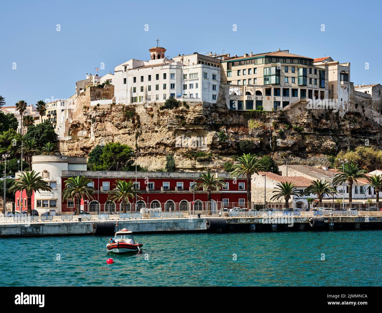 Architecture of houses on the coast of the port of Mahon (Mao) in ...