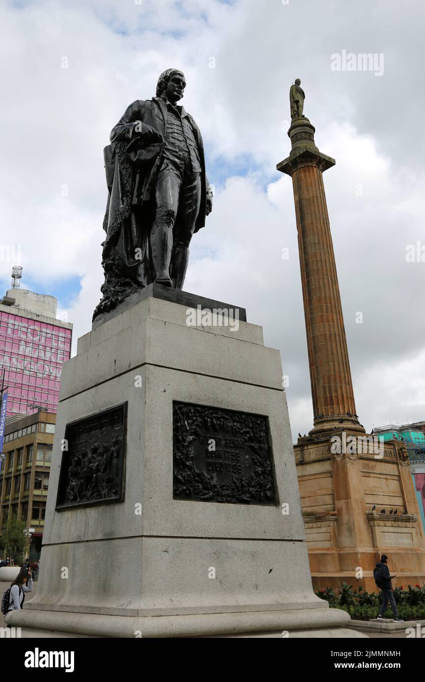 George Square, Glasgow, Scotland, UK. A bronze statue of Scottish Poet ...