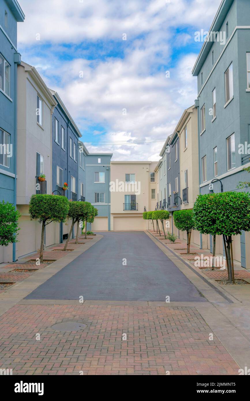 Empty driveway in the middle of residential buildings at Silicon Valley ...