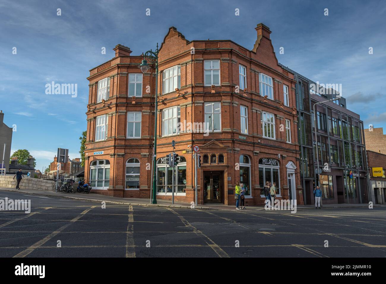 A beautiful view of a building with small windows under the clear sky ...