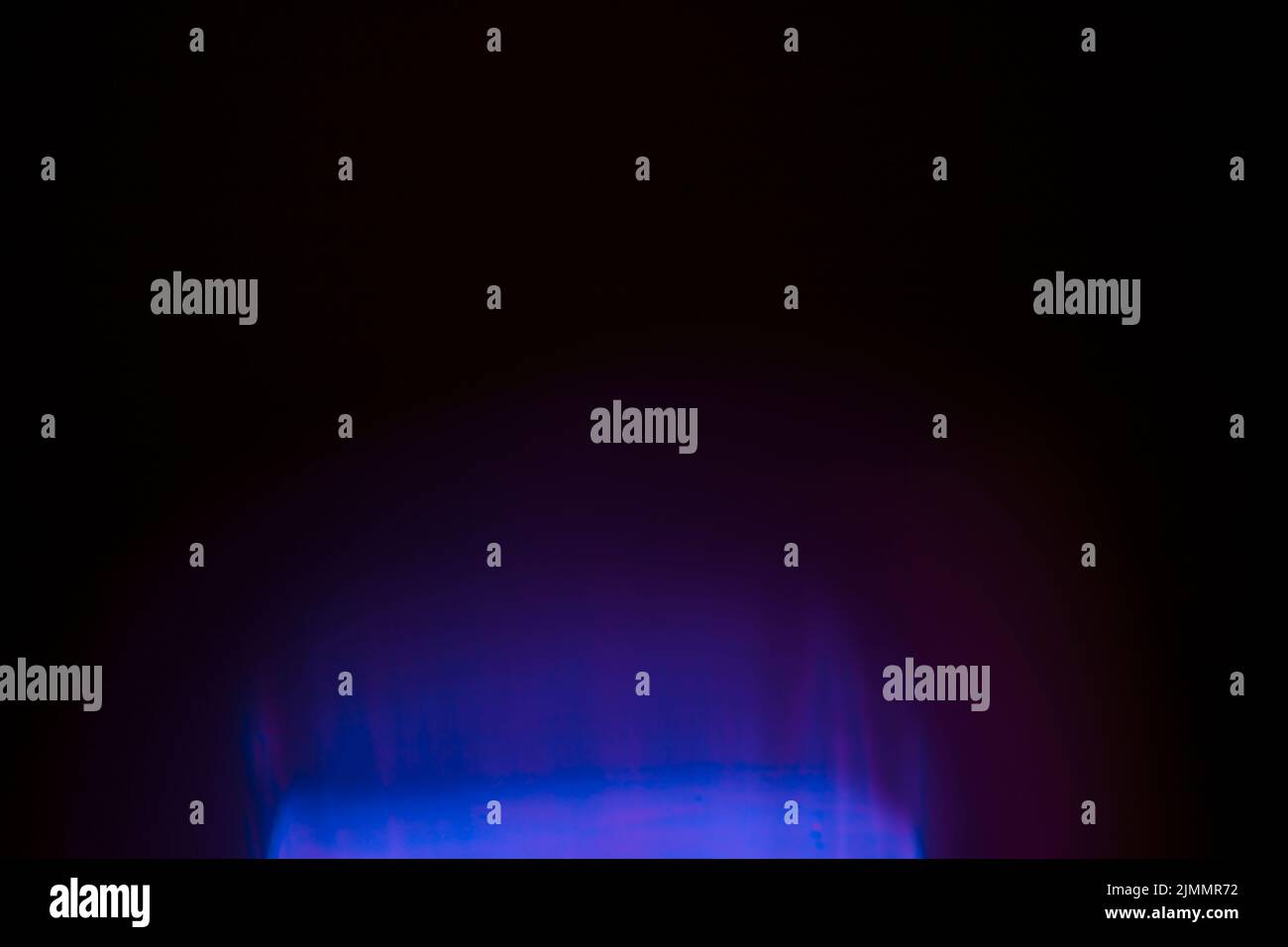 Bright light dark background Stock Photo - Alamy