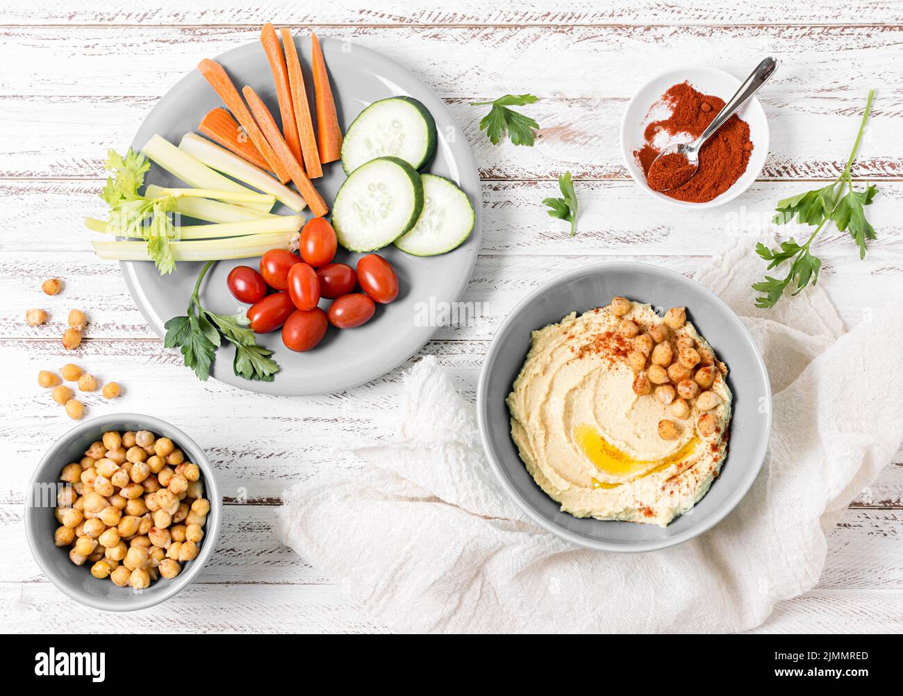Top view vegetables with hummus Stock Photo - Alamy