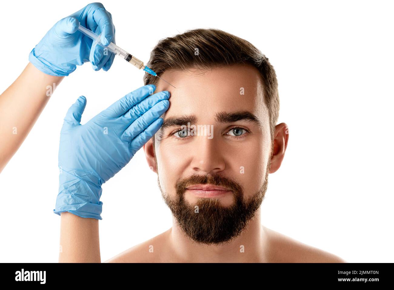 Handsome man receiving facial injection for skin rejuvenation Stock ...