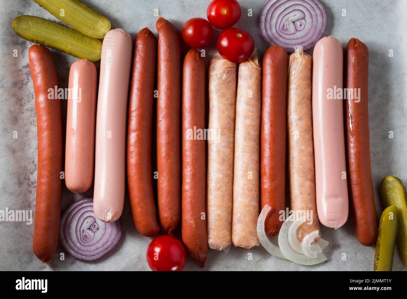 Top view sausage assortment with onion Stock Photo - Alamy