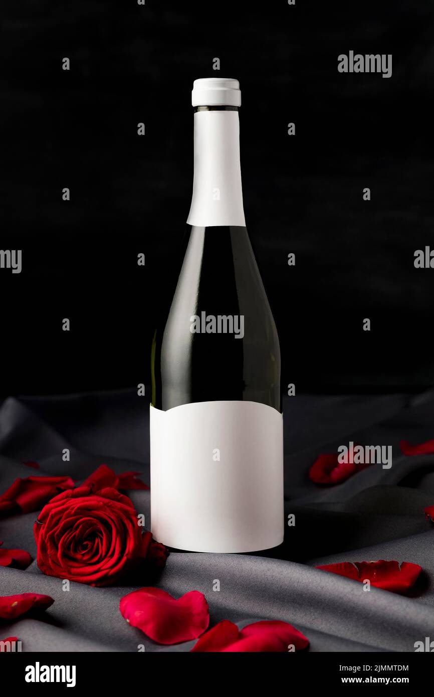 Champagne bottle red roses hi-res stock photography and images - Alamy
