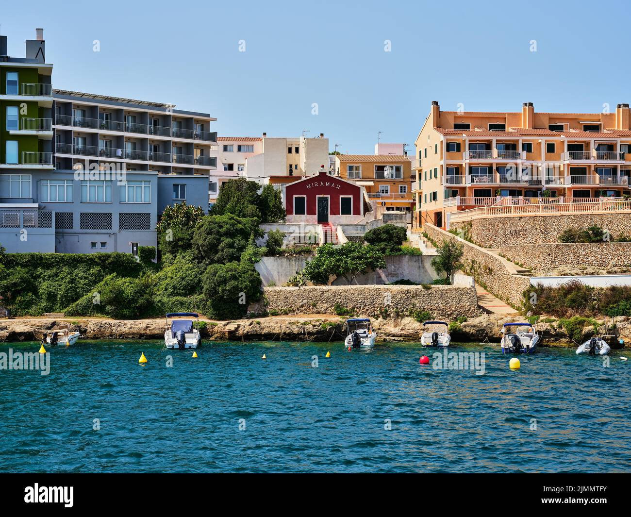 Architecture of houses on the coast of the port of Mahon (Mao) in ...
