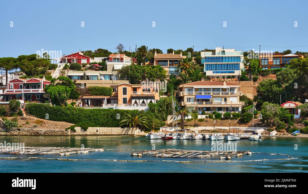 Architecture of houses on the coast of the port of Mahon (Mao) in ...