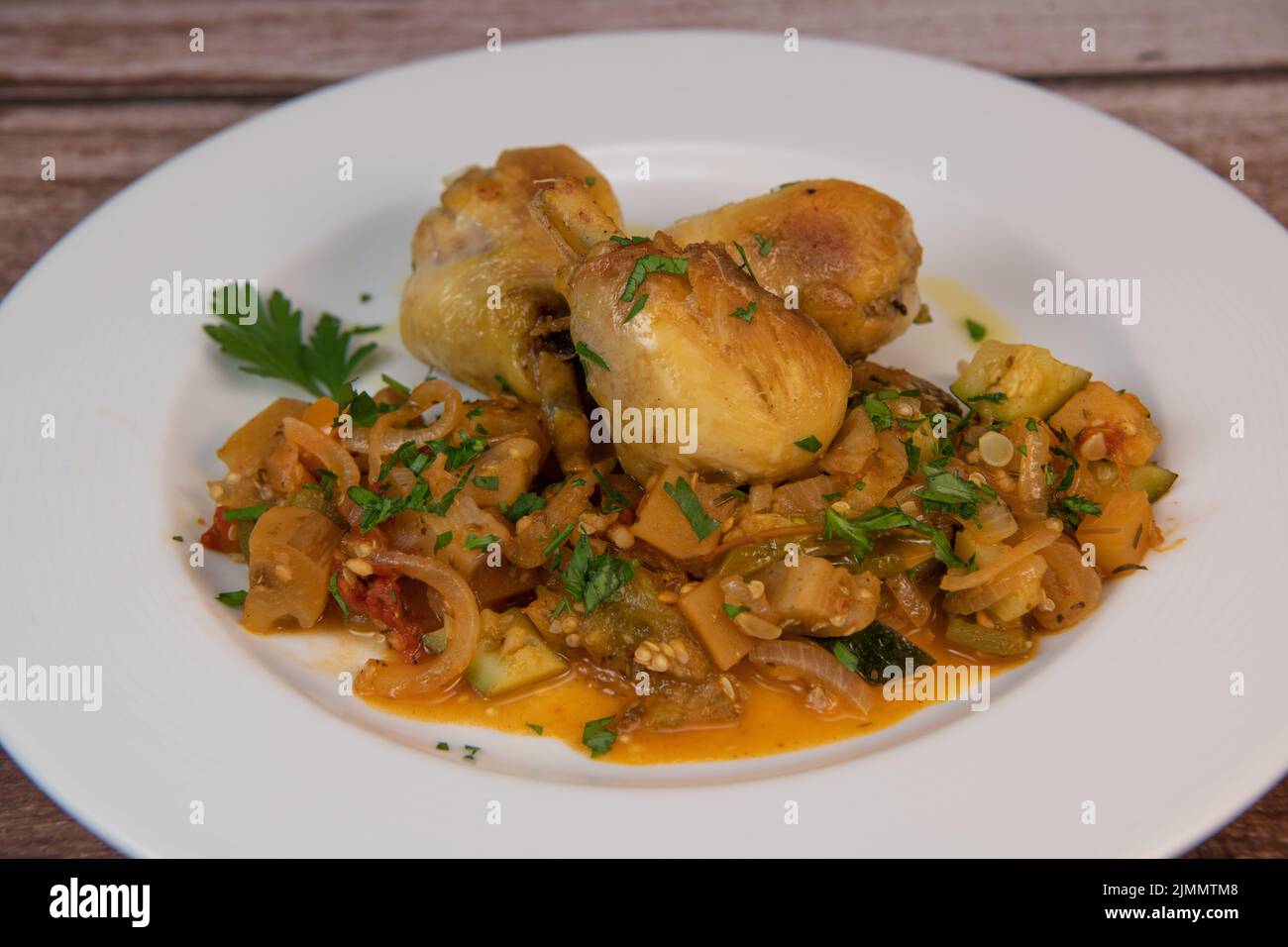 Delicious chicken with oven-roasted ratatouille vegetables Stock Photo ...