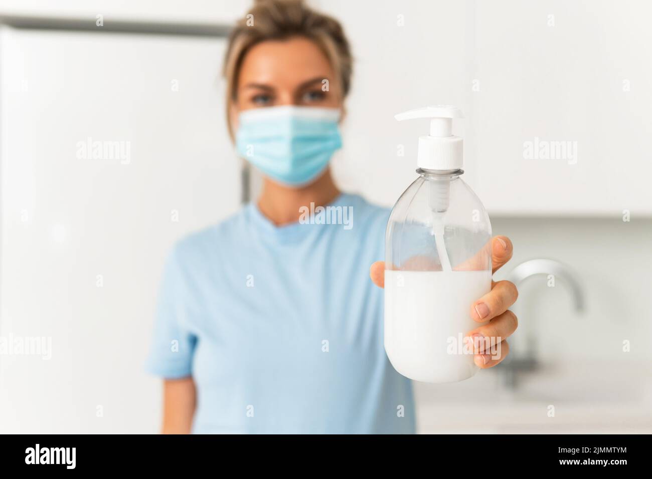 Woman washing hands soap protect hi-res stock photography and images ...