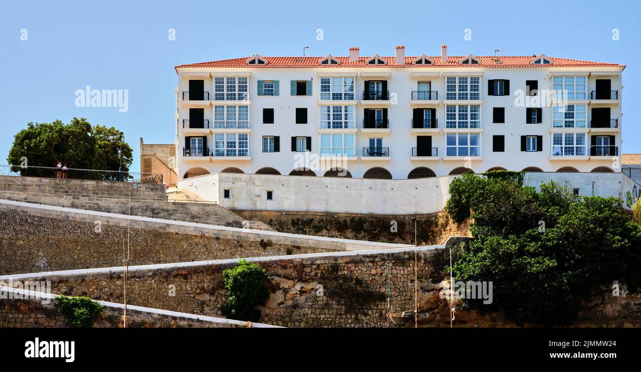 Architecture of houses on the coast of the port of Mahon (Mao) in ...