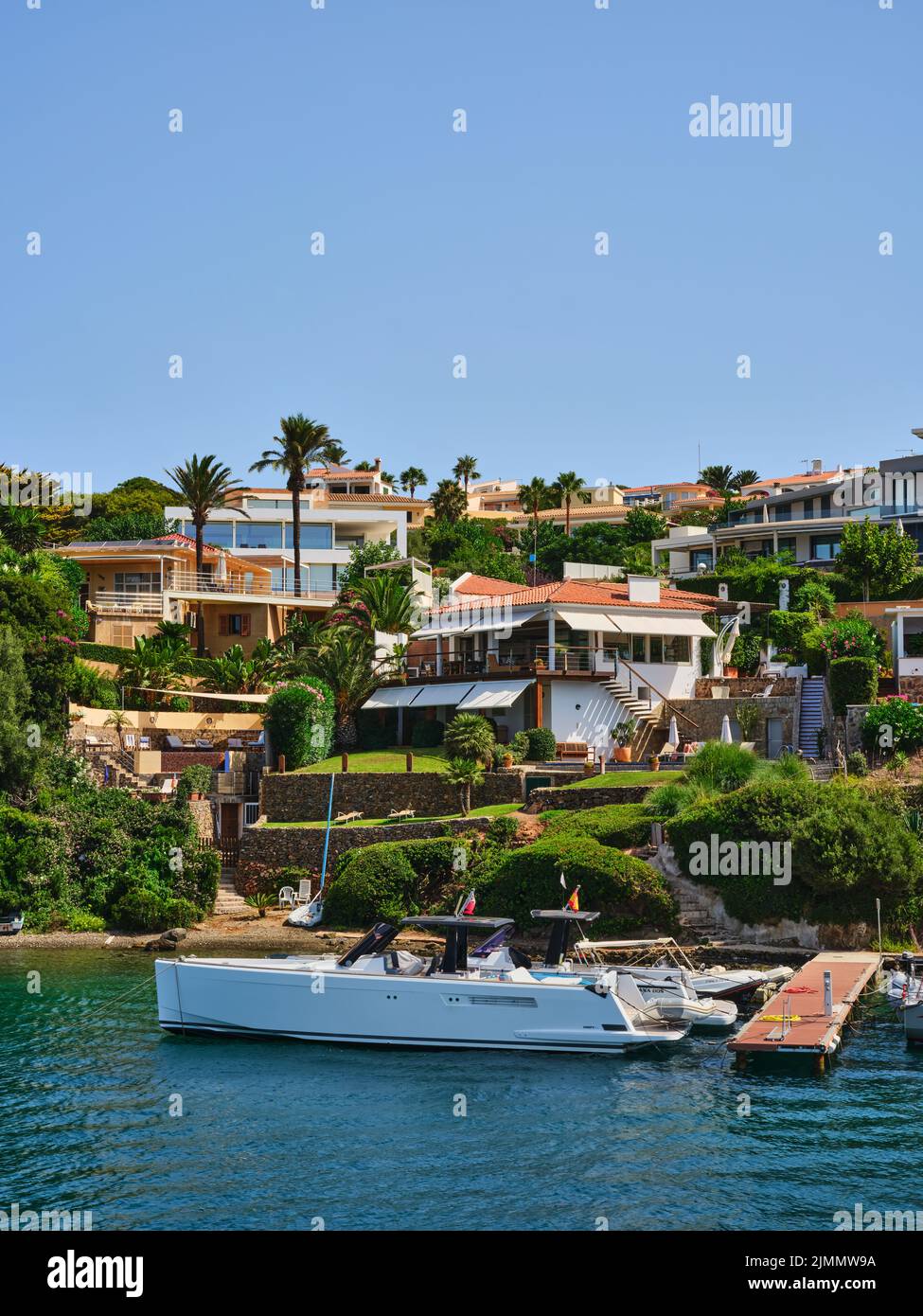 Architecture of houses on the coast of the port of Mahon (Mao) in ...